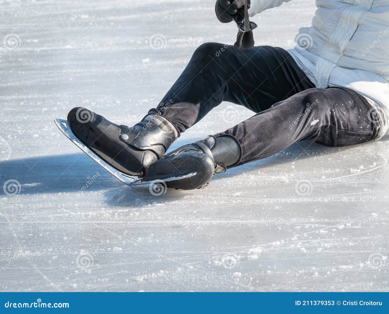 Man on Ice Skates Falling on the Ice Rink Stock Image - Image of ...