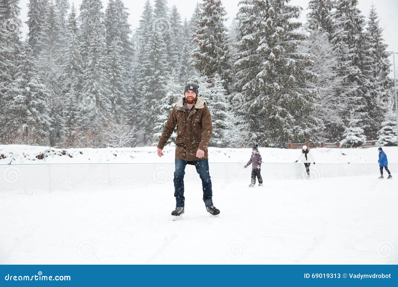 Man ice skating outdoors stock image. Image of outdoors - 69019313