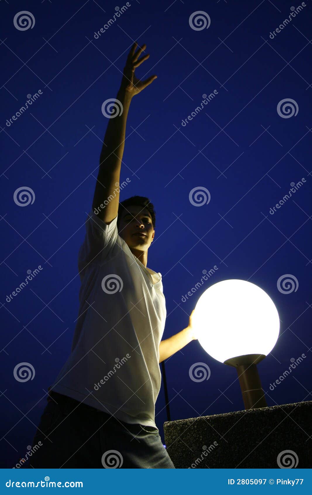 Man Illuminated by Night Lamp Stock Image - Image of illuminating ...