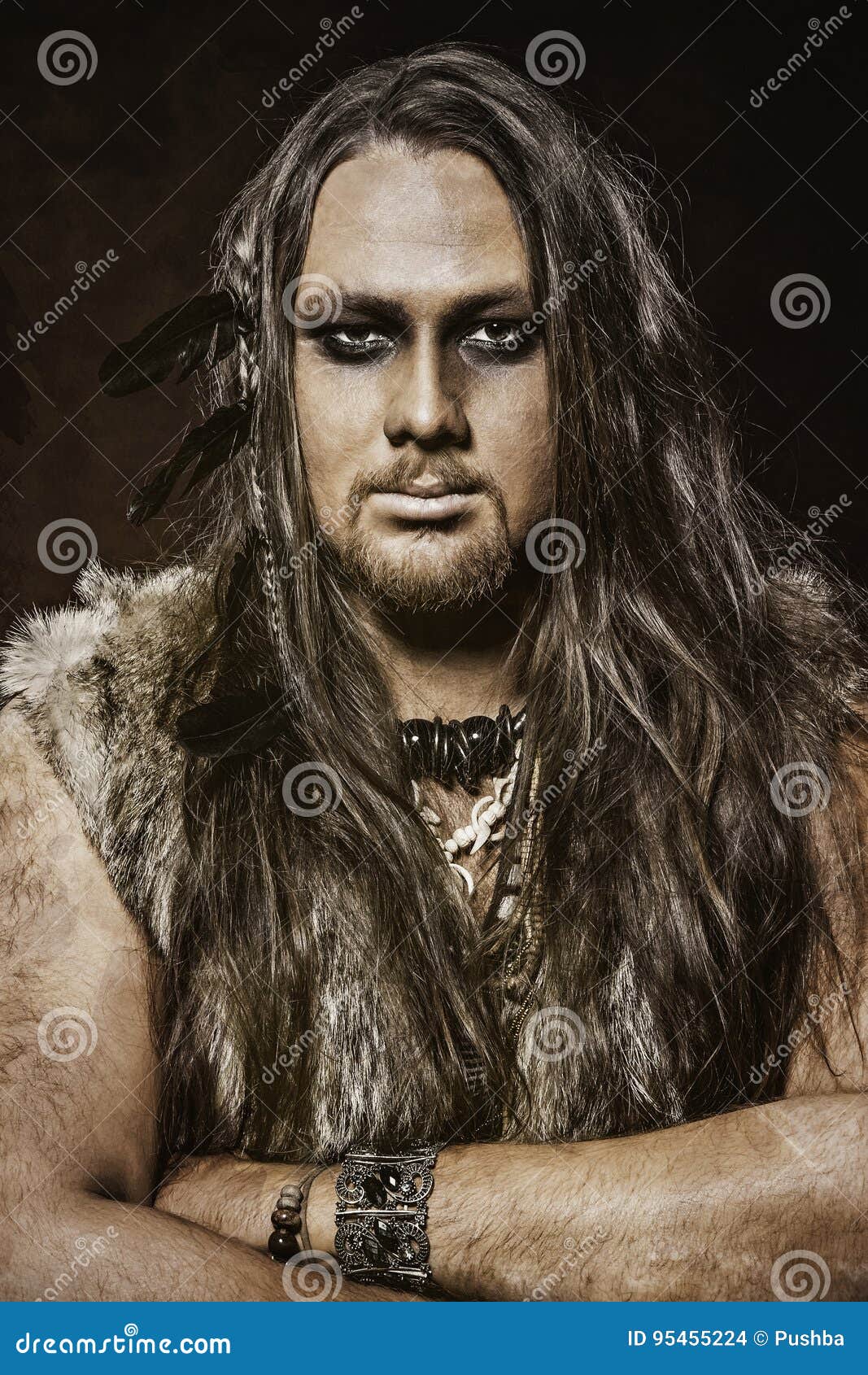Man in the Image of the Barbarian with Decorations of Beads and ...
