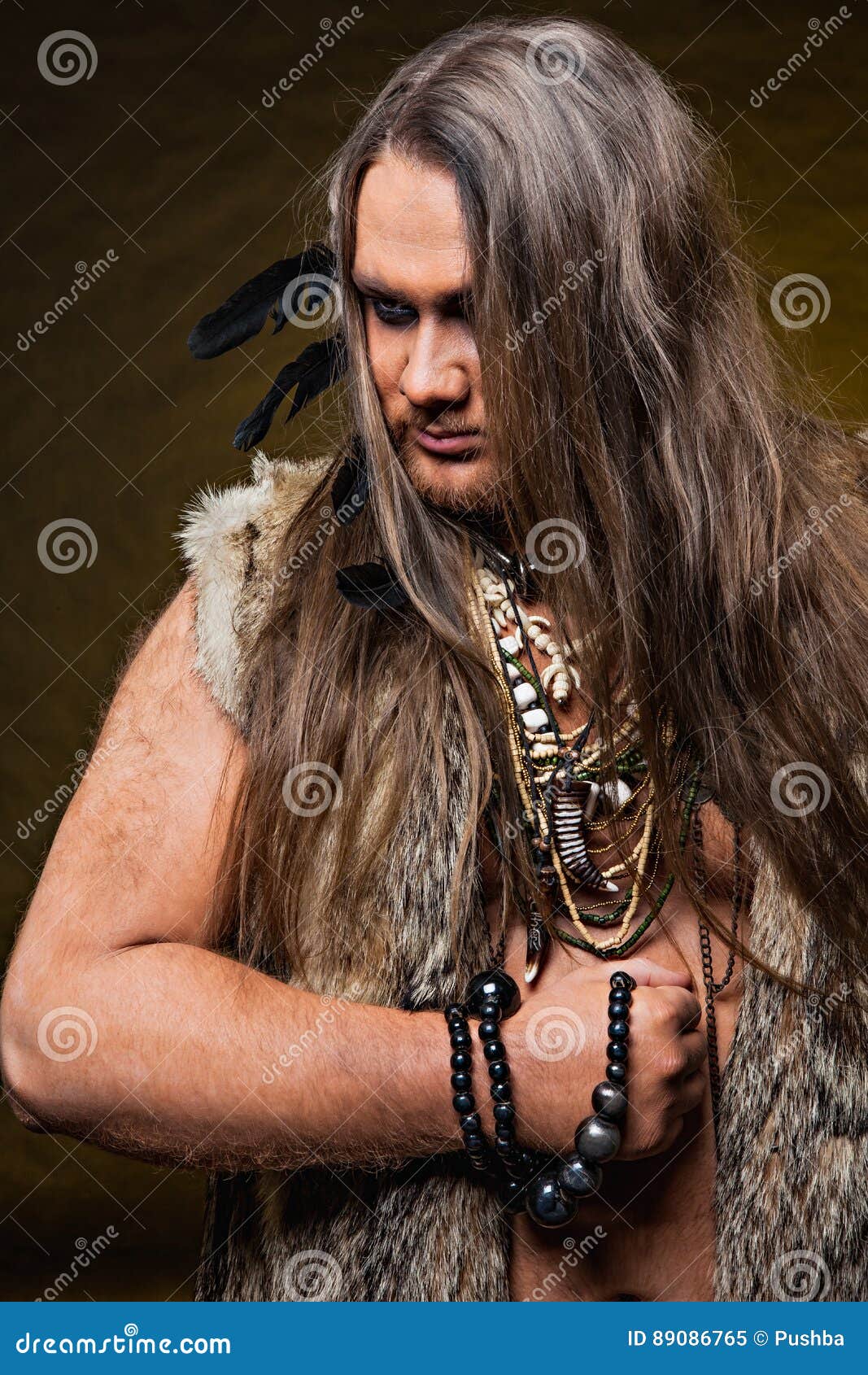 A Man in the Image of the Barbarian Stock Image - Image of beads, long ...