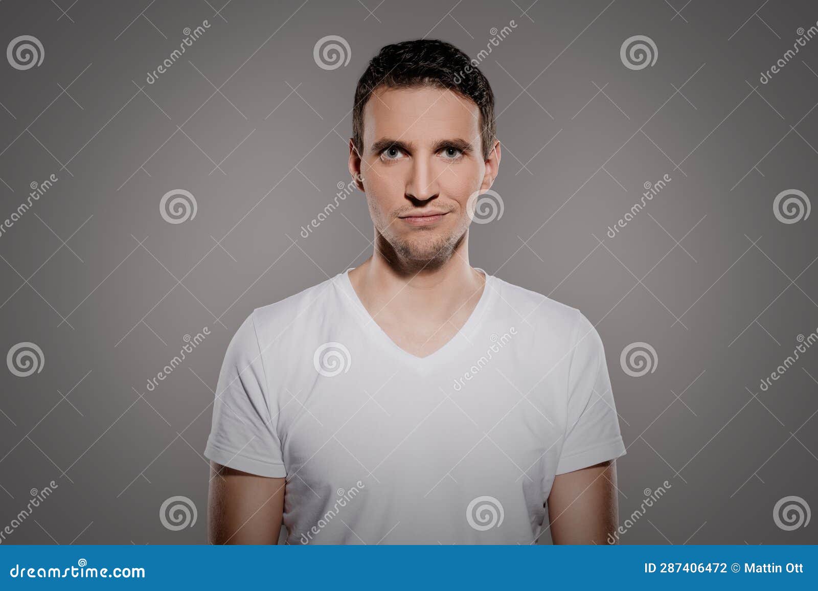 Man with an Impish Grinning on His Face while Looking at the Camera and ...