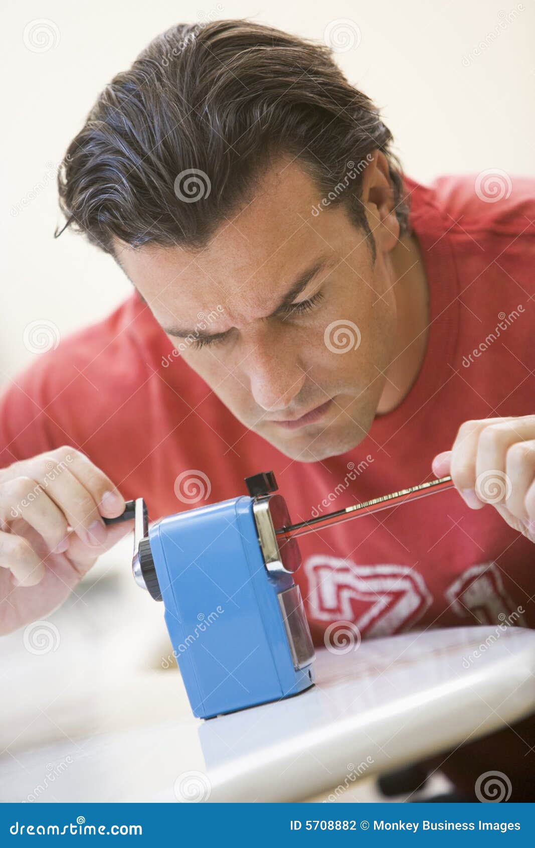 Man Indoors Using Pencil Sharpener Stock Photo - Image of twenties ...