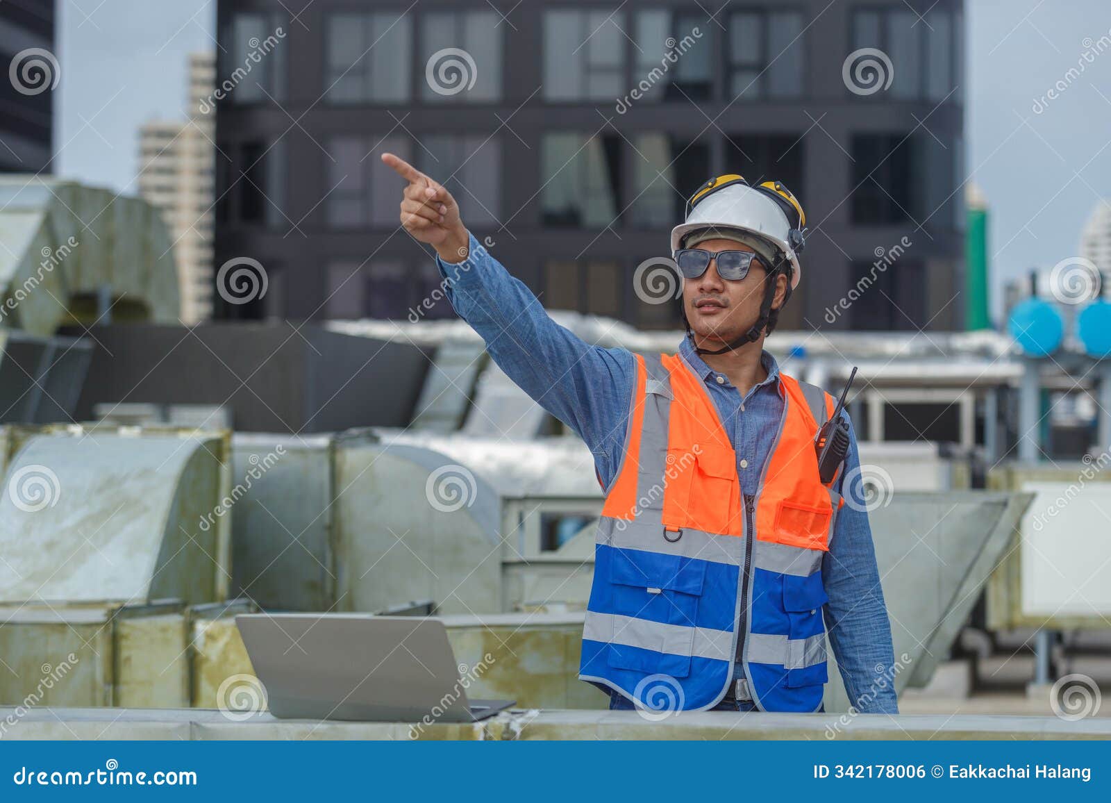 Man Industrial Engineer with Walkie Talkie Pointing Work at Rooftop ...