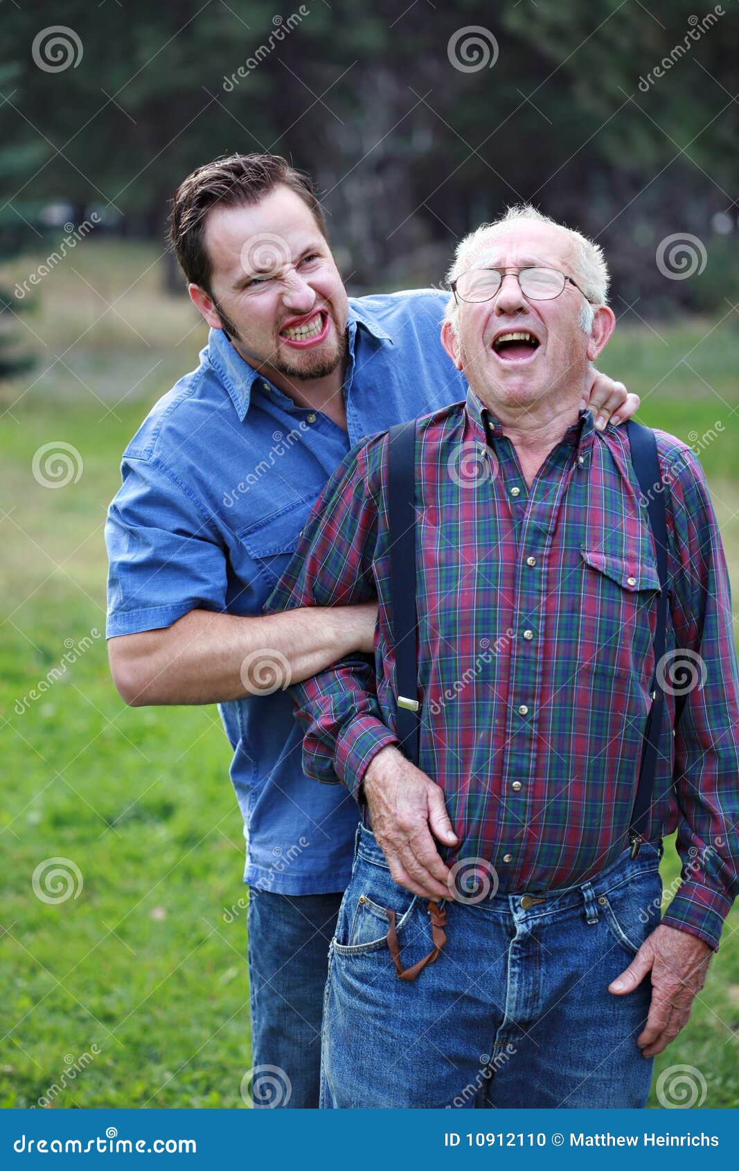 Man Inflicting Pain on Senior Stock Photo - Image of clothes, hold ...