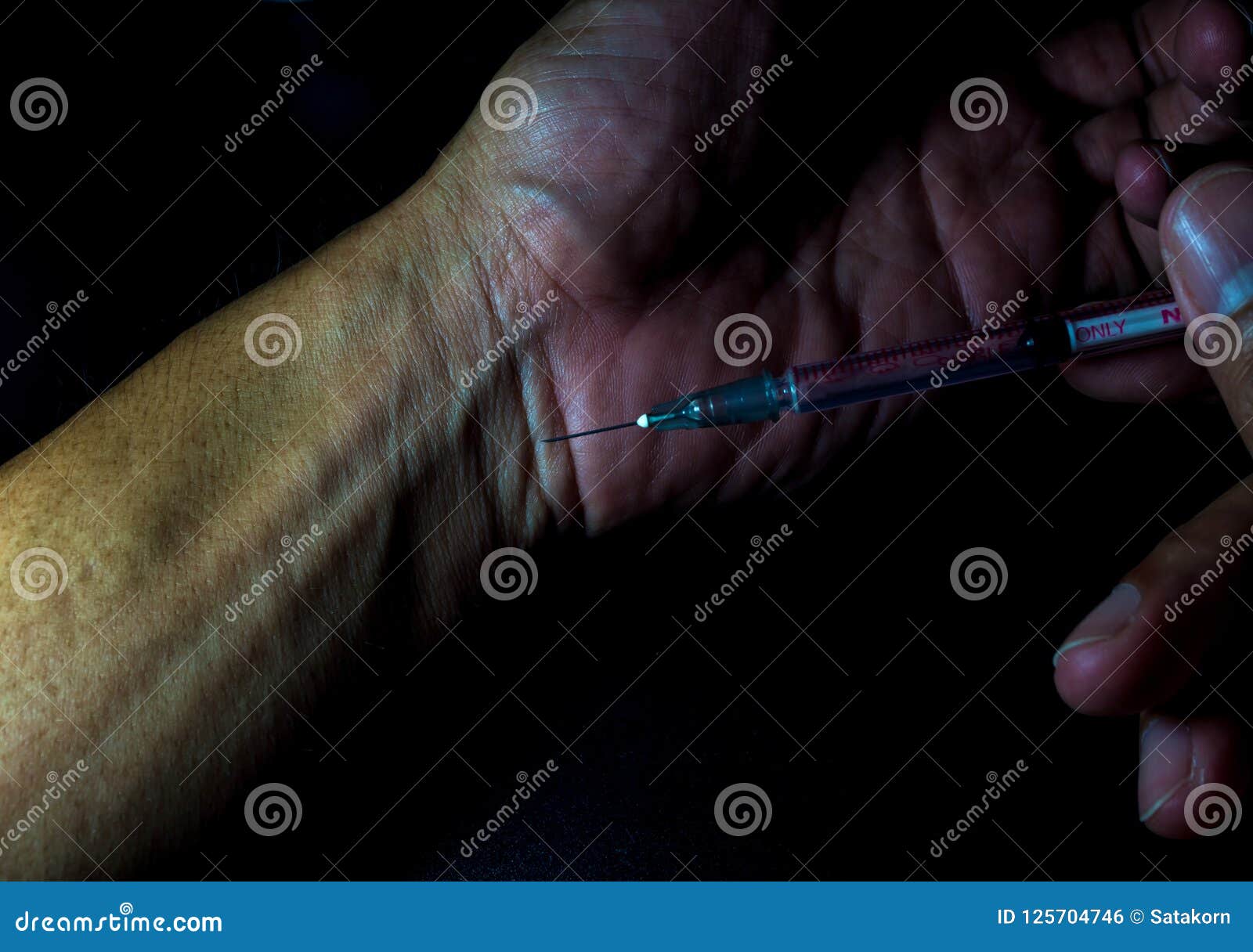 Man with Syringe To His Hand Stock Photo - Image of skin, concept ...