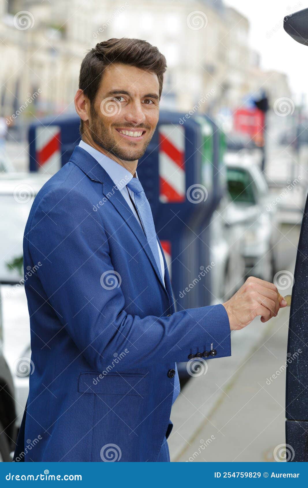 Man Inserting Coin in Vending Ticket Machine Stock Image - Image of ...