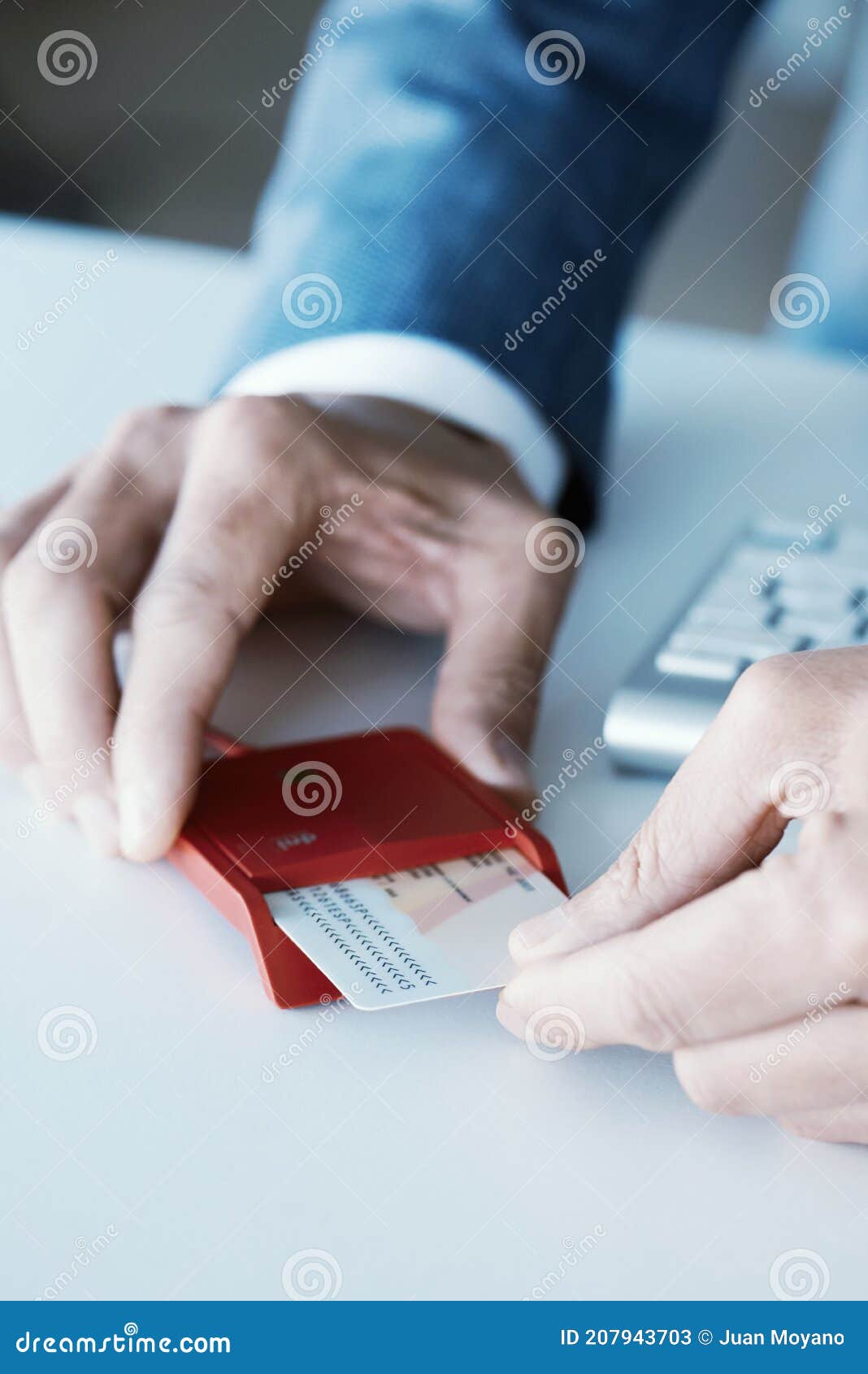 Man Inserting an Electronic Identification in a Reader Stock Image ...