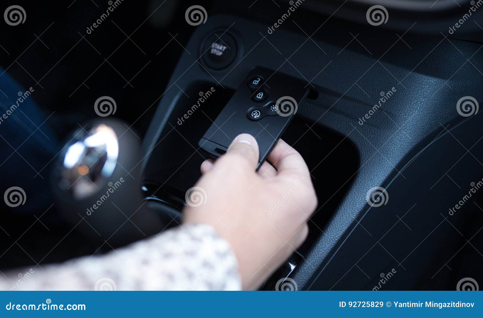The Man Inserts the Key Card into the Slot in the Car To Start the ...