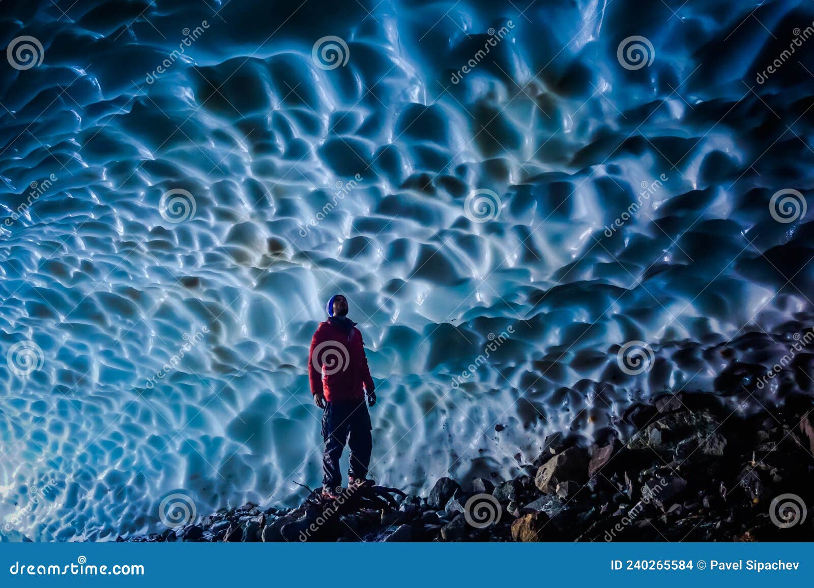 Man inside an ice cave stock photo. Image of caves, frozen - 240265584