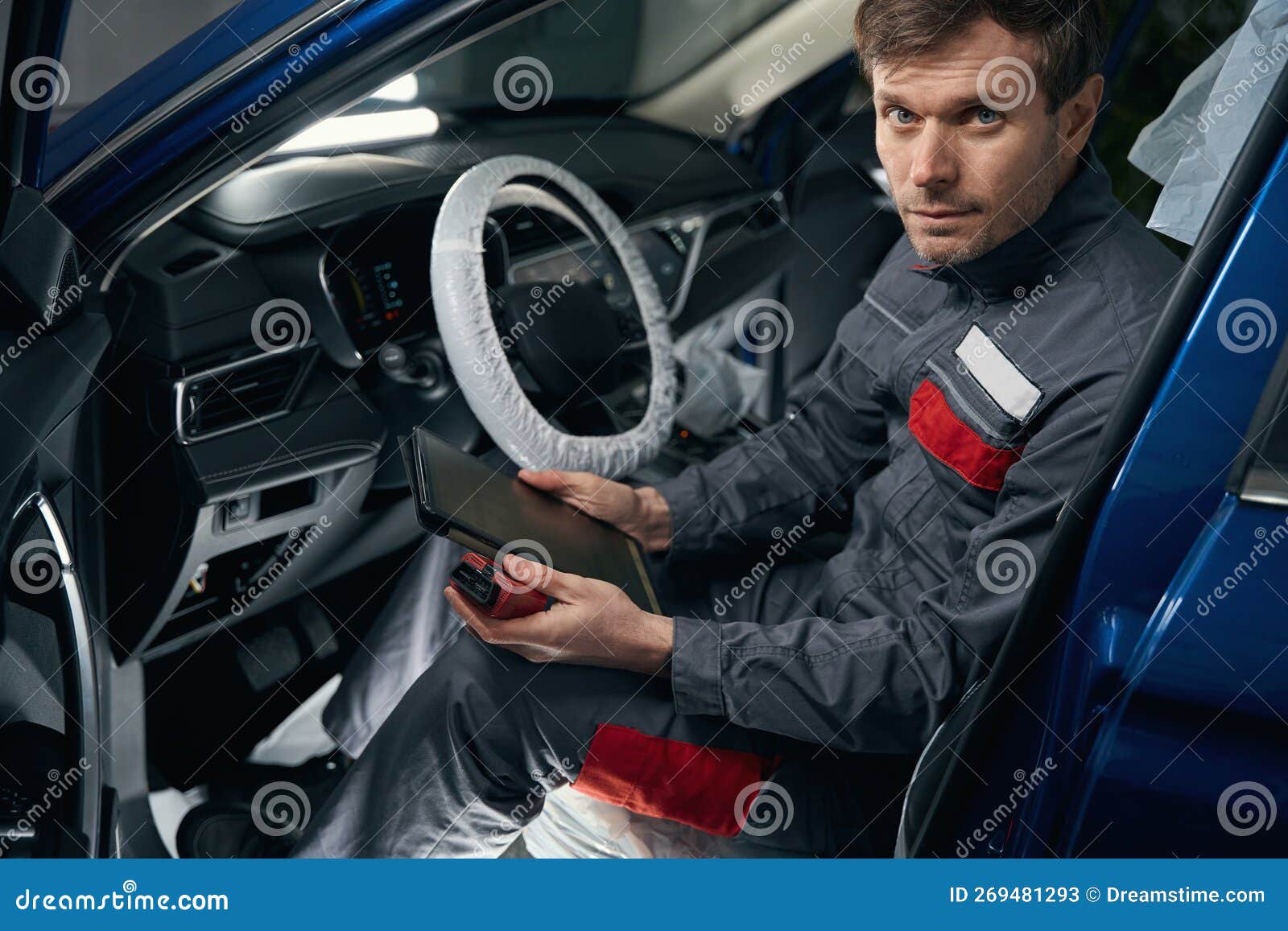 Man Inspecting Board Computer System in the Workshop Stock Image ...