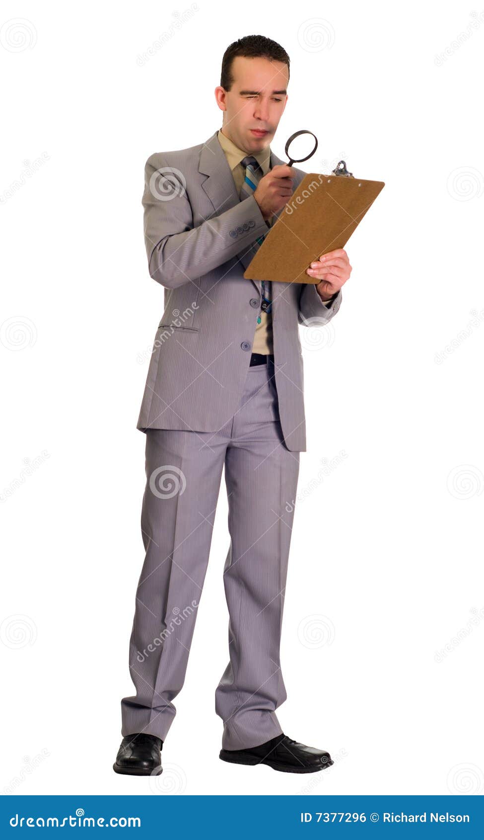 Man Inspecting Checklist stock photo. Image of businessman - 7377296