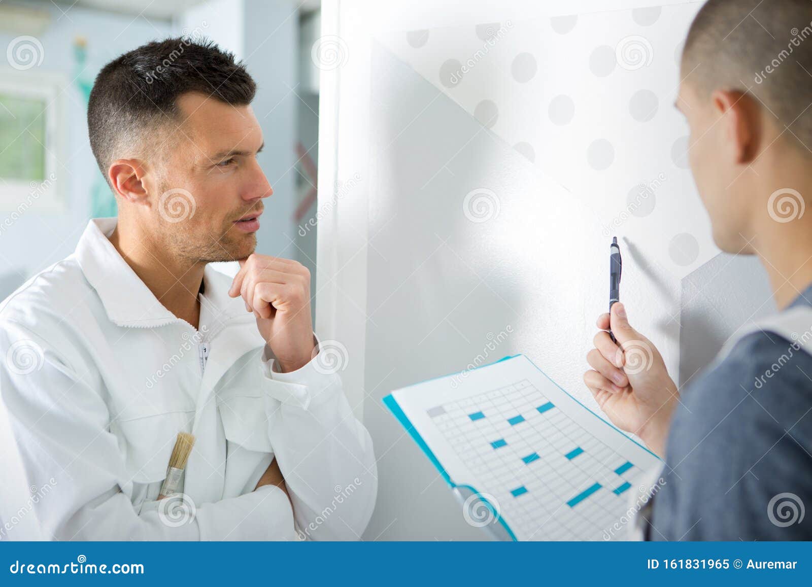 Man Inspecting Plastered Wall Stock Image - Image of challenge, choice ...