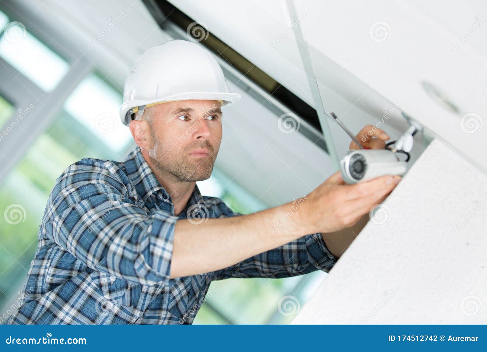 Man installing cctv camera stock photo. Image of theft - 174512742