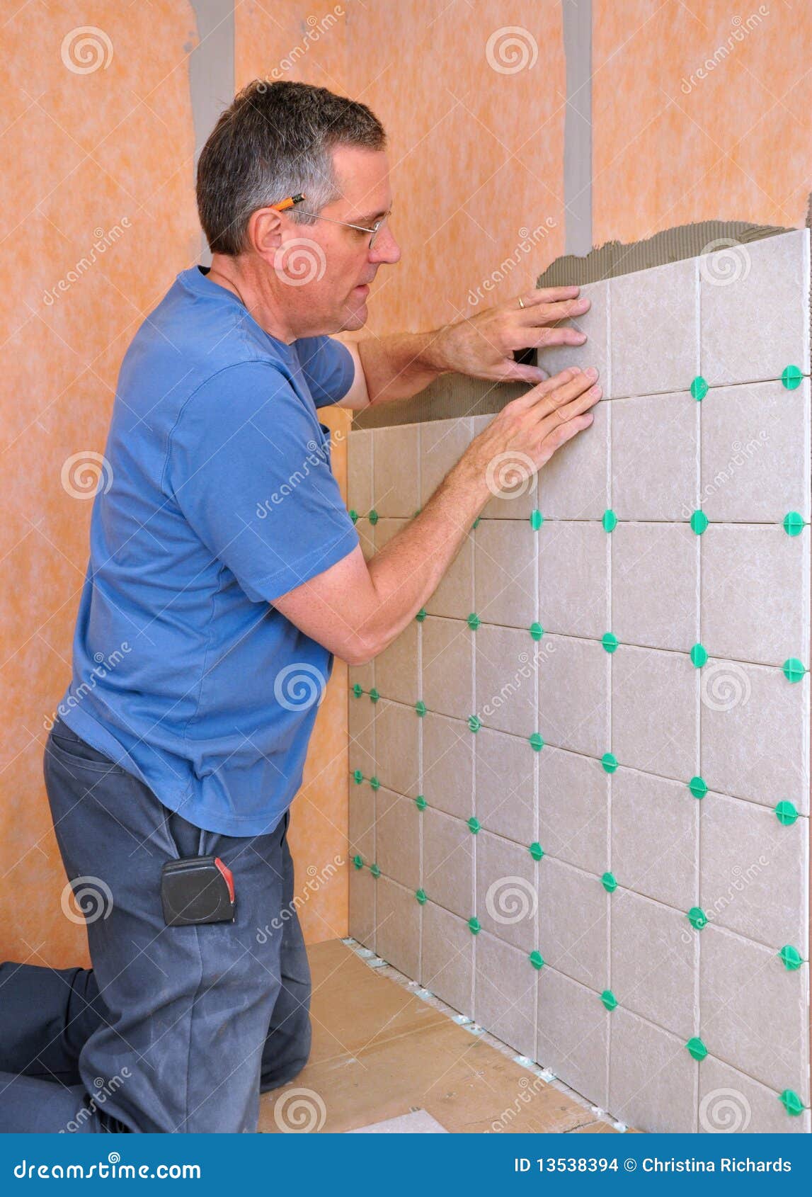 Man Installing Ceramic Tile Stock Photo - Image of tile, ceramic: 13538394