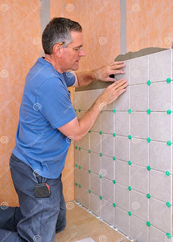 Man Installing Ceramic Tile Stock Photo - Image of tile, ceramic: 13538394