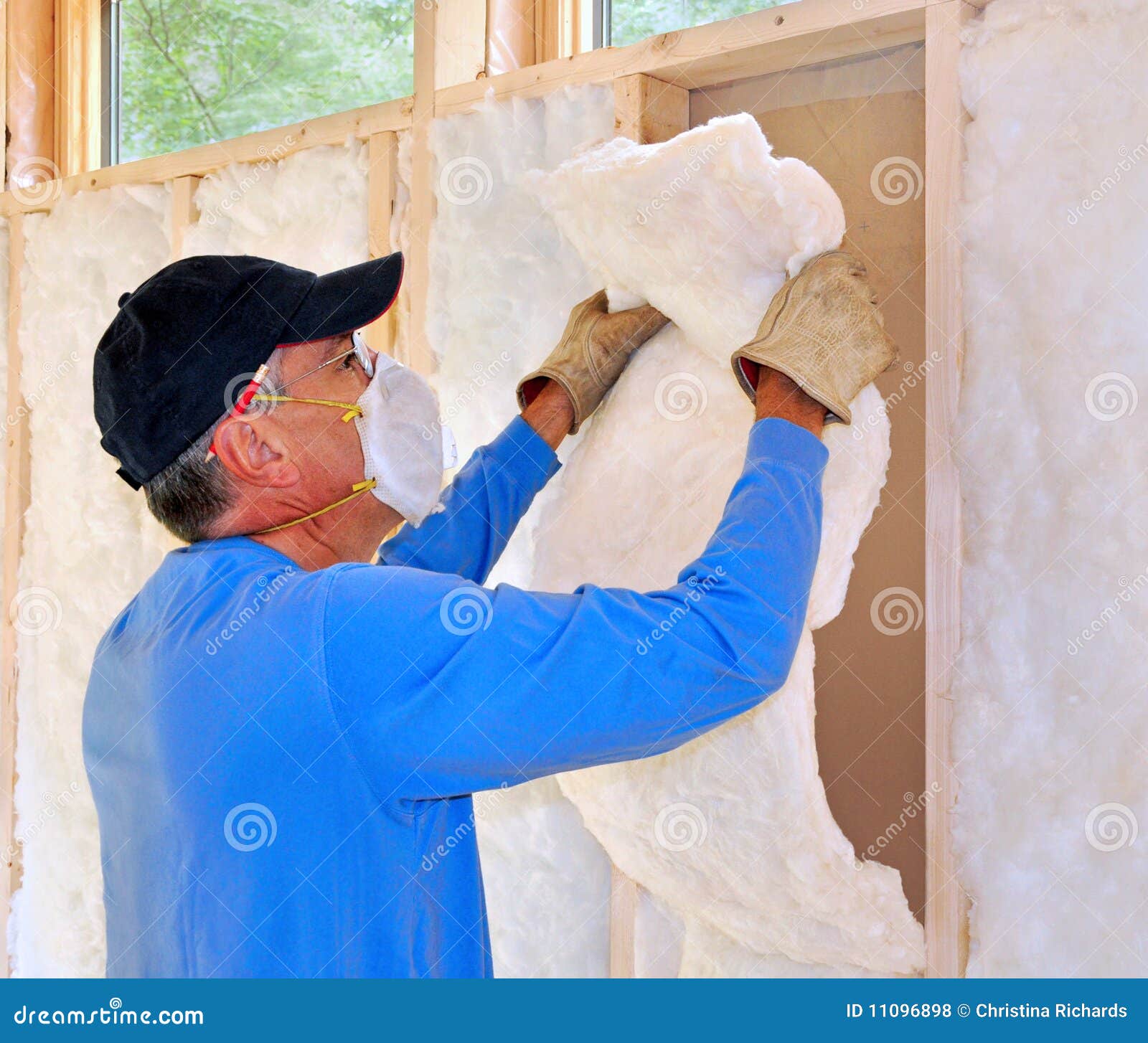 Man Installing Fiberglass Insulation Stock Photo - Image of insulation ...