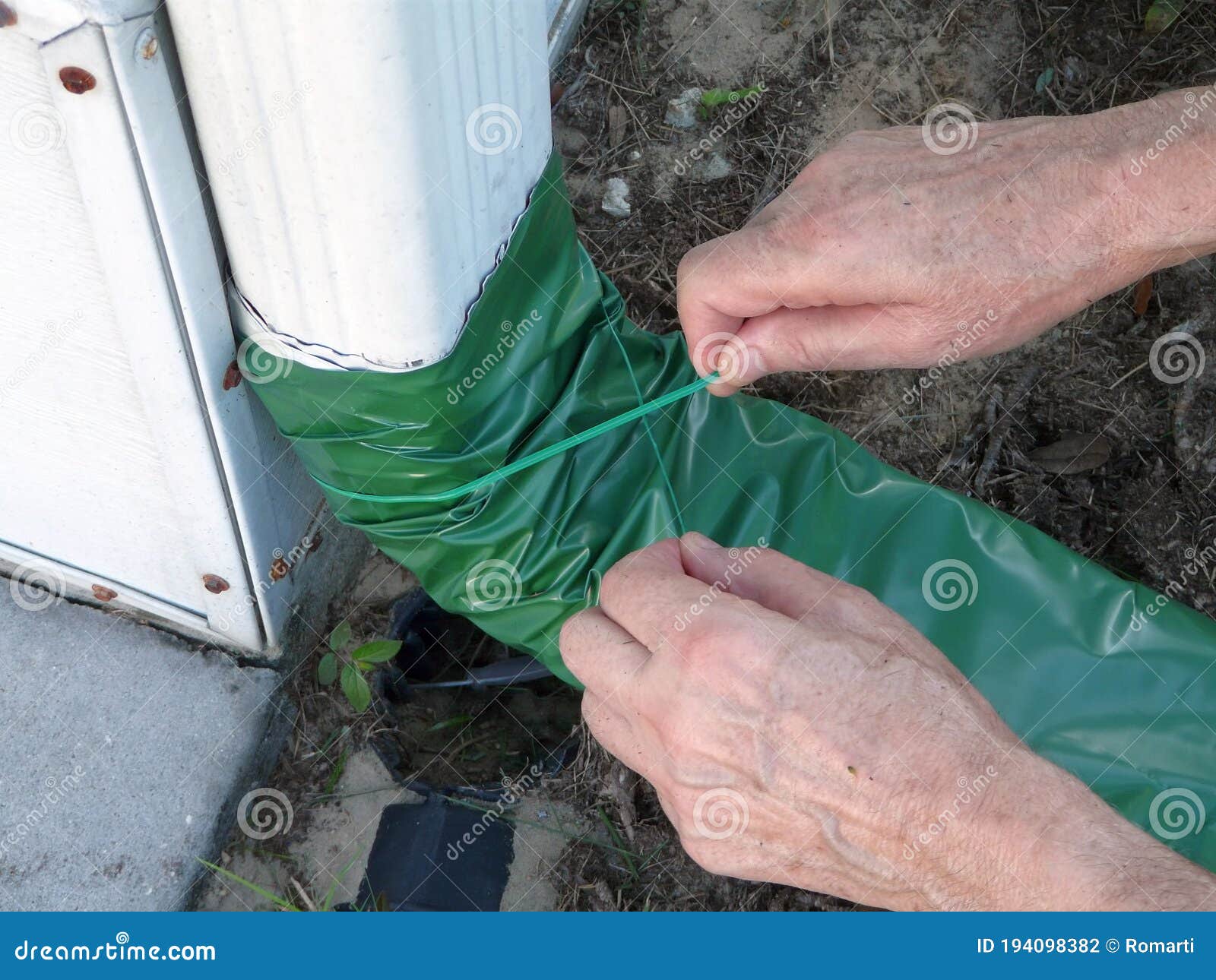 Man Installing Gutter Downspout Retractable Extender Stock Photo ... Man Installing Gutter Downspout Retractable Extender Stock Photo ...