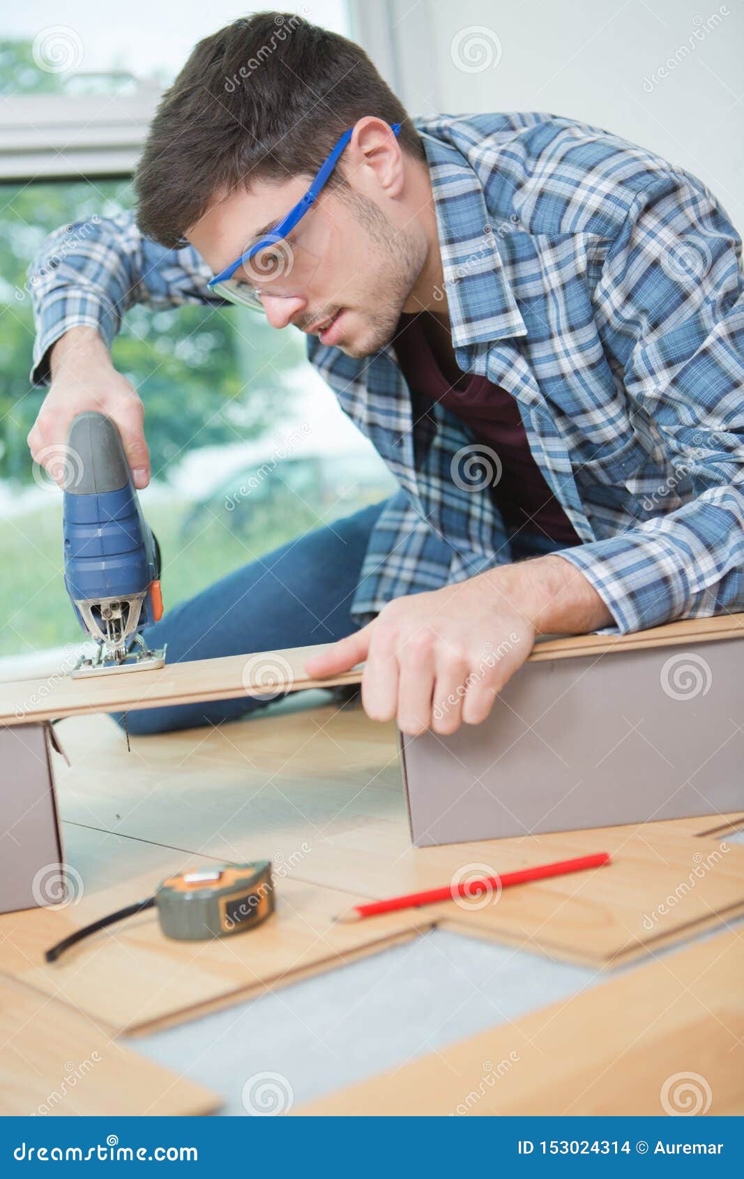 Man Installing New Laminated Wooden Floor Stock Photo - Image of indoor ...