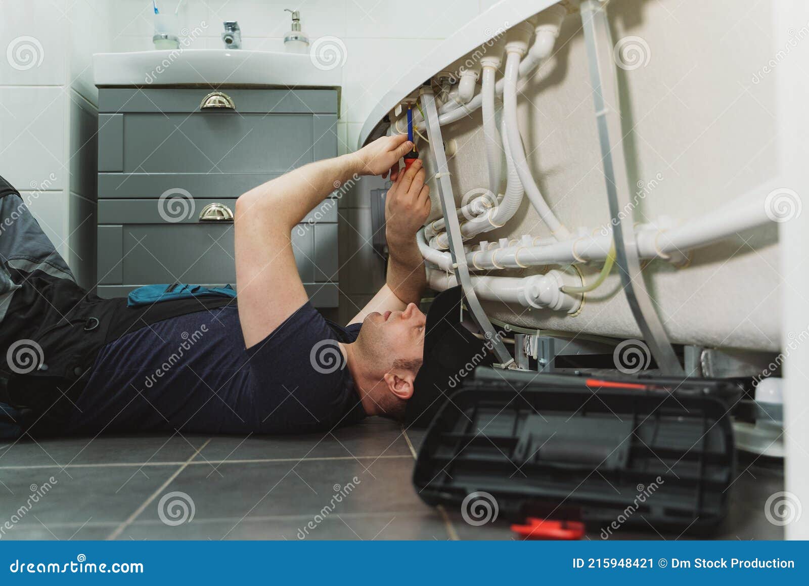Man Installing Pipe System of Bathtub Stock Image - Image of person ...