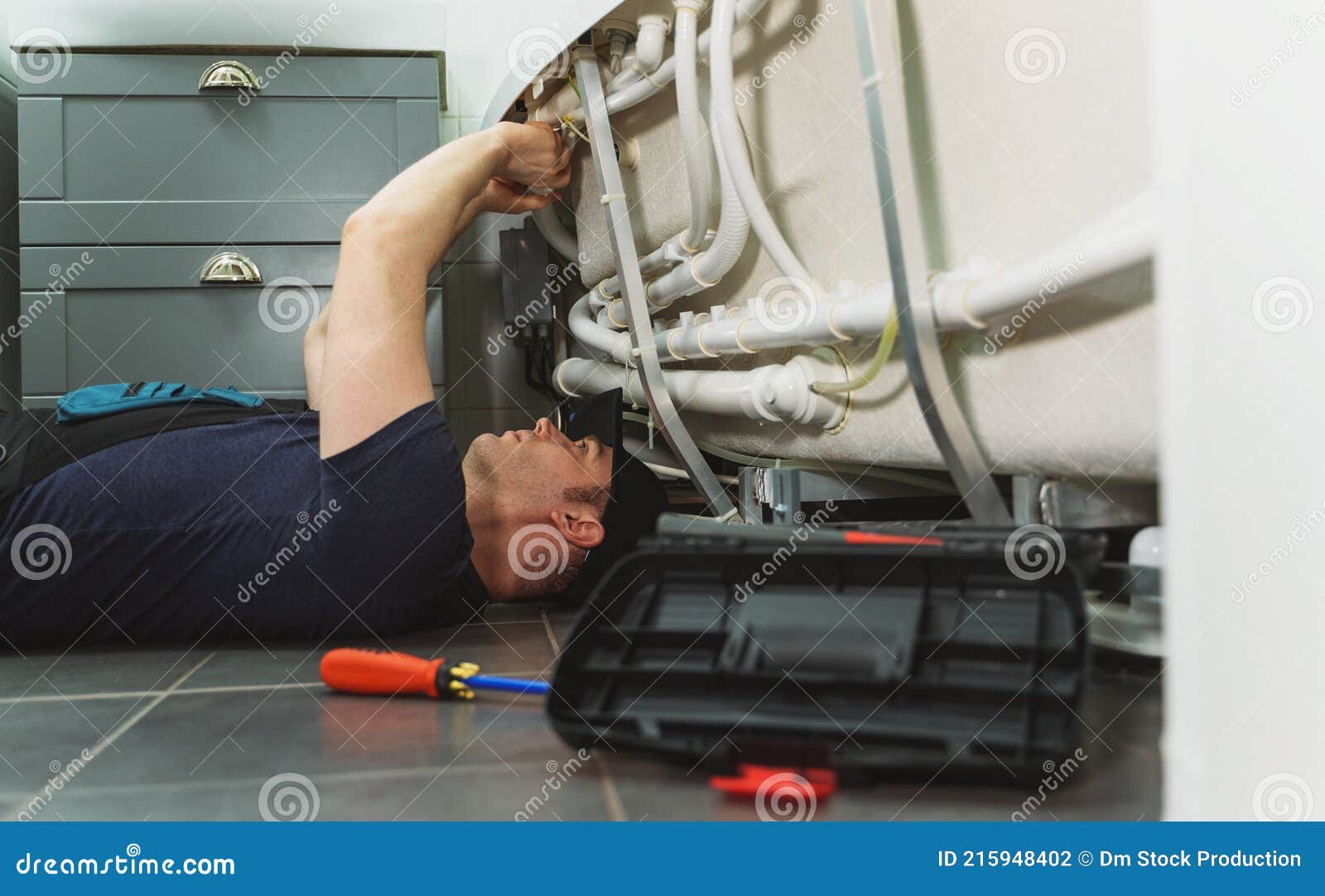 Man Installing Pipe System of Bathtub Stock Photo - Image of manual ...