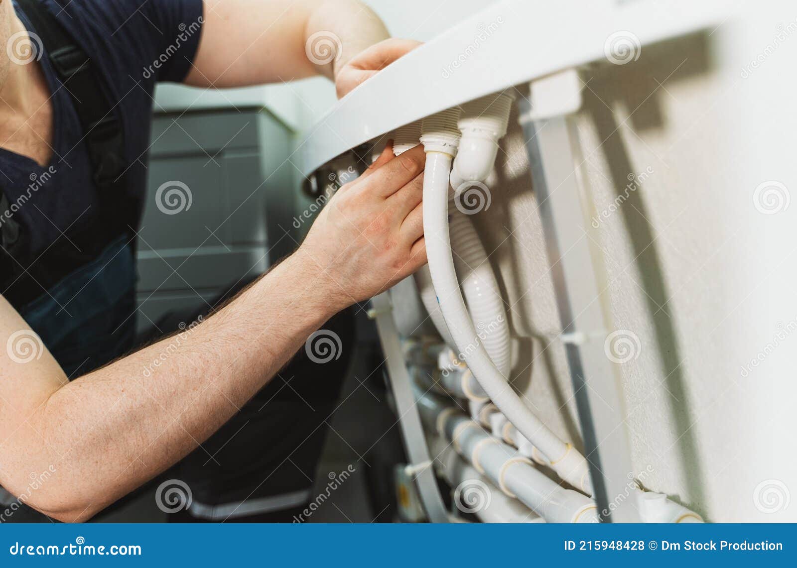 Man Installing Pipe System of Bathtub Stock Photo - Image of equipment ...
