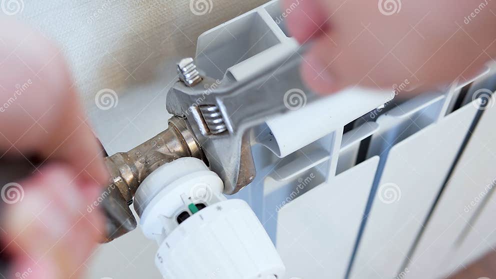 Man Installing Radiator Valve Close Up Stock Image - Image of regulator ...