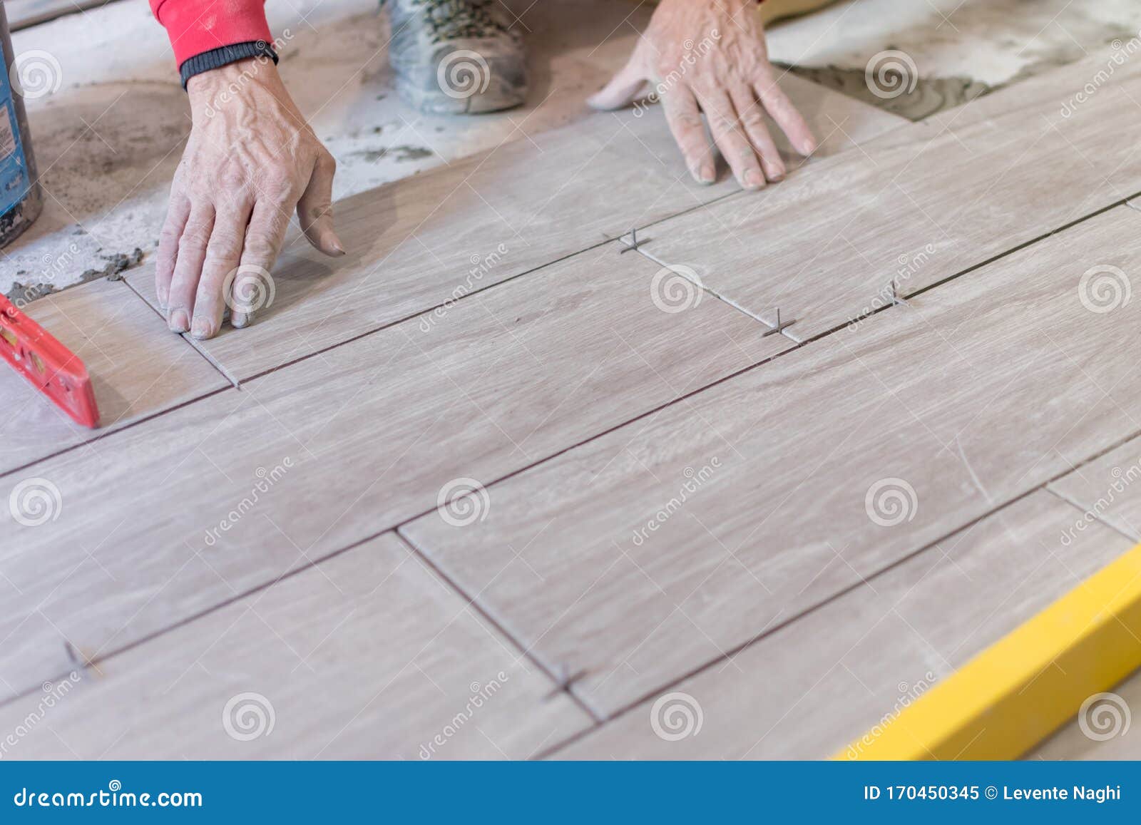 Close Up Shot of Unfinished Floor Tiles Installation in Kitchen Stock ...