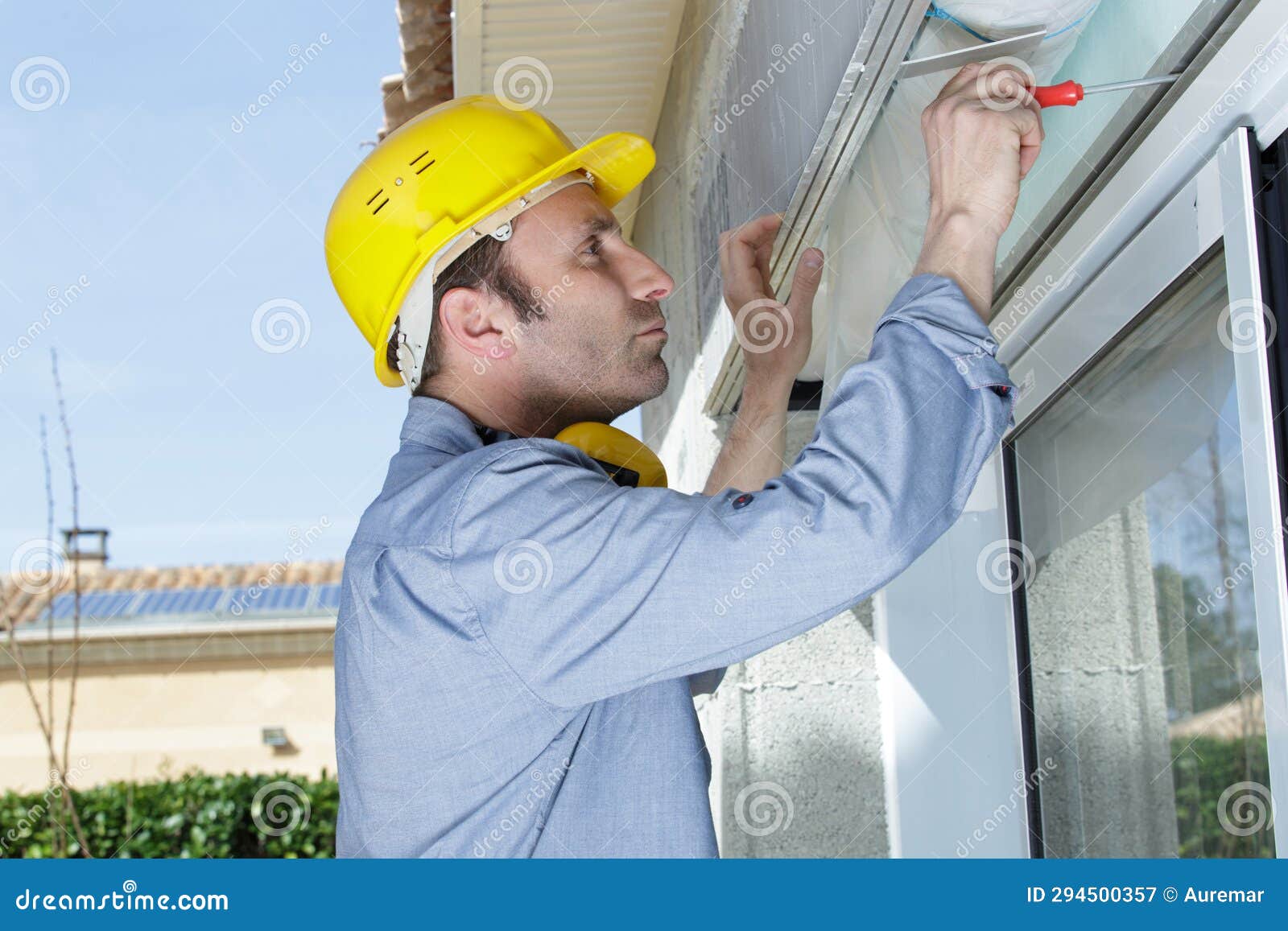 Man Installing Roller Shutter Above Doors Stock Image - Image of doors ...