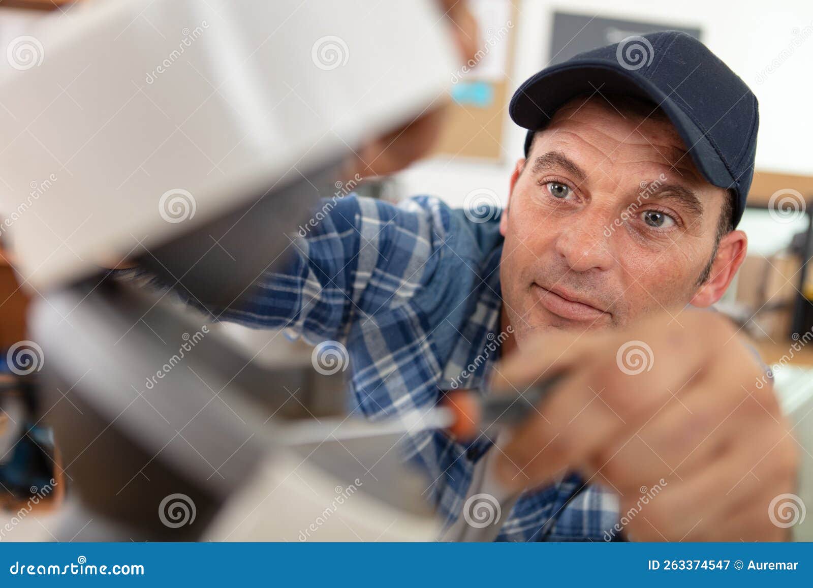 Man Installing Something with Tools Stock Image - Image of construction ...