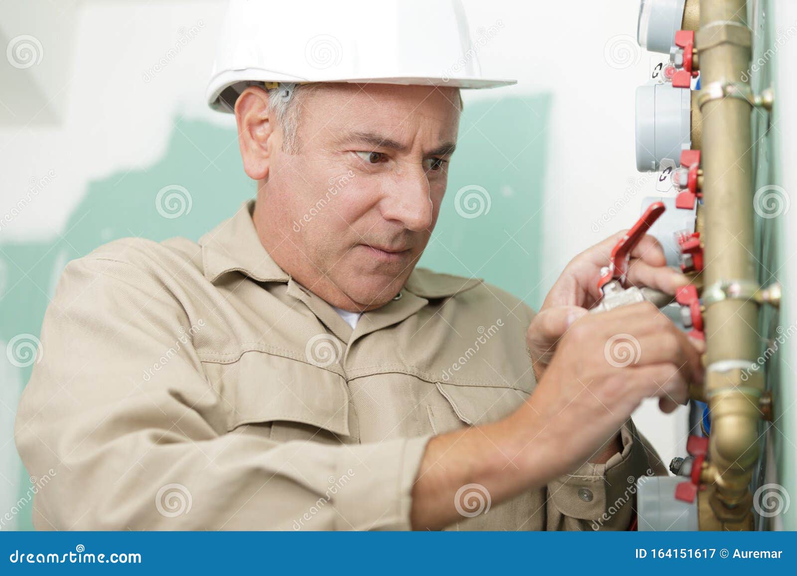 Man Installing Water Meters Stock Image - Image of pipes, number: 164151617 Man Installing Water Meters Stock Image - Image of pipes, number: 164151617