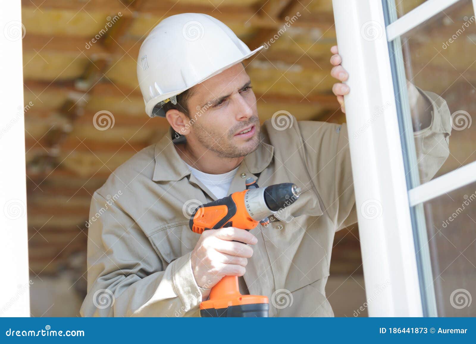 Man installing window stock image. Image of toughness - 186441873