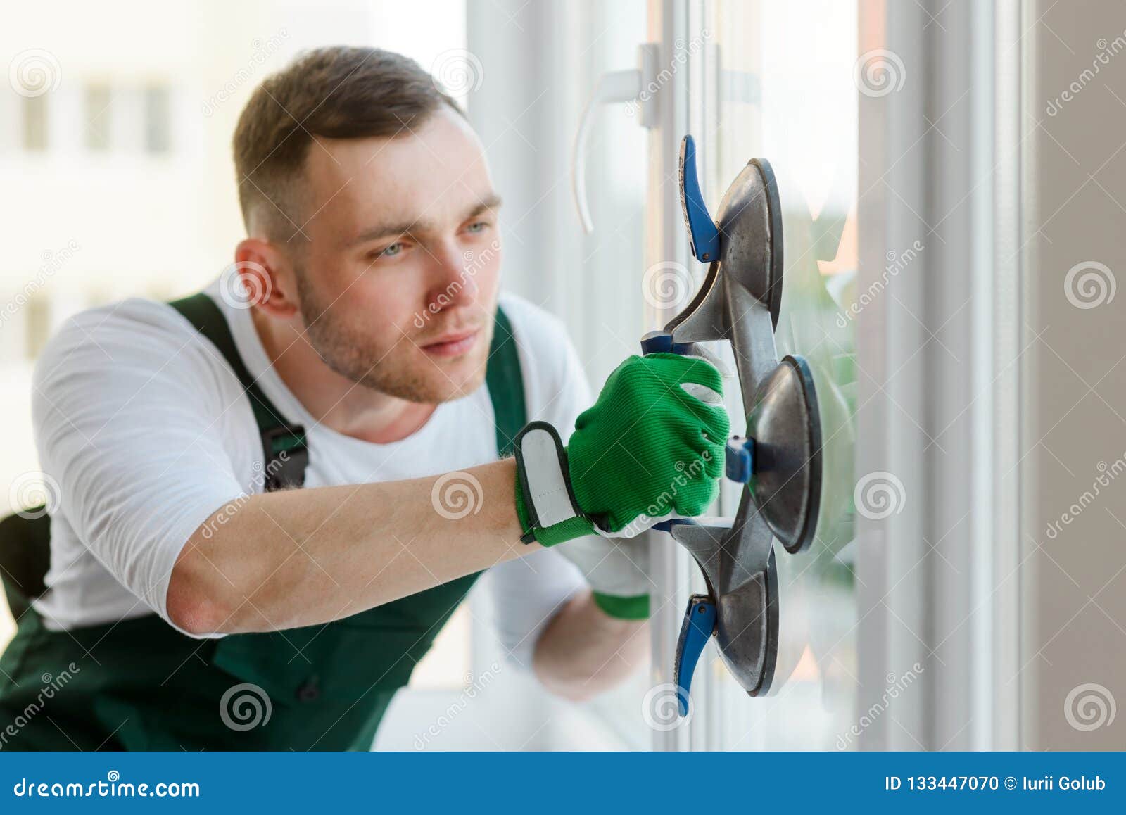 Man is installing a window stock photo. Image of industrial - 133447070