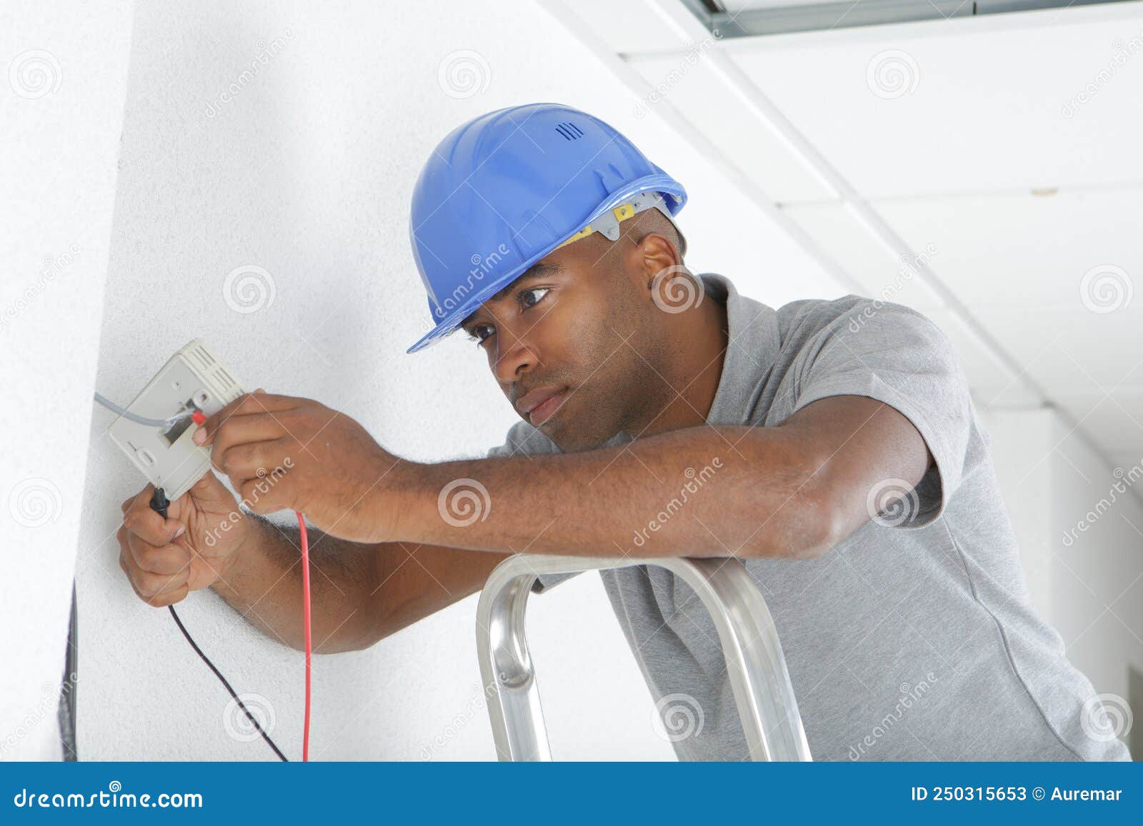 Man installing wiring stock image. Image of working - 250315653