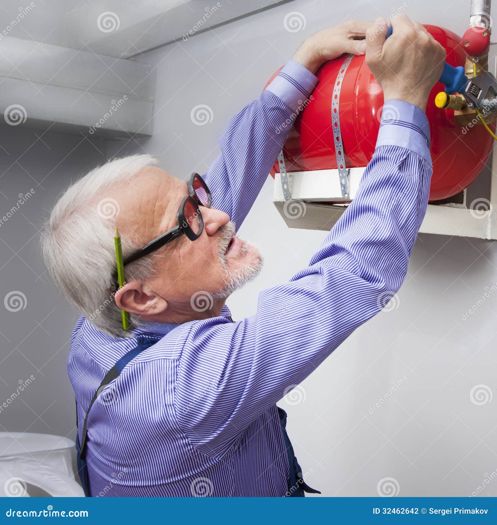 Man Installs Fire Extinguisher Stock Photo - Image of pensil, foam ...