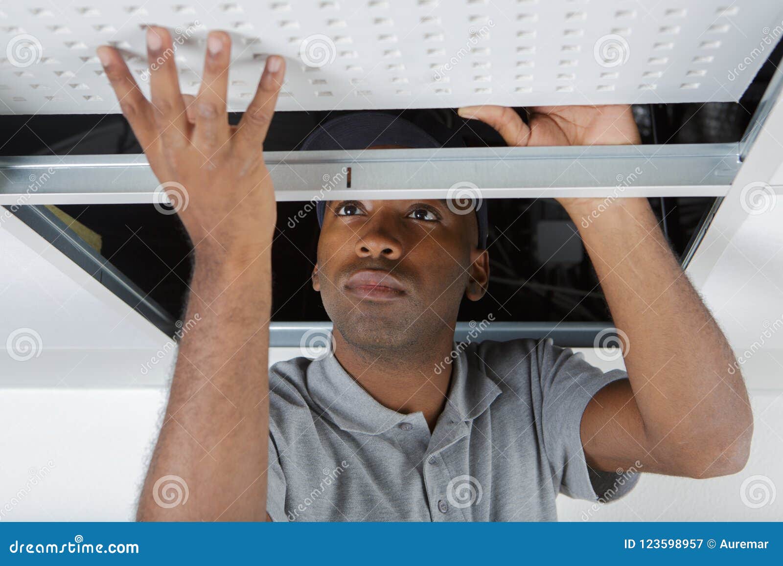 Man Installs Suspended Ceiling in House Stock Image - Image of ...