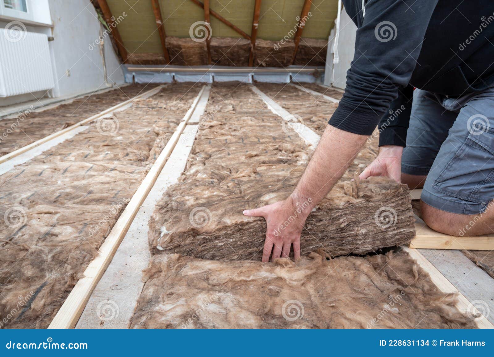 Man Insulating the Attic with Rock Wool. Stock Photo - Image of fixing ...