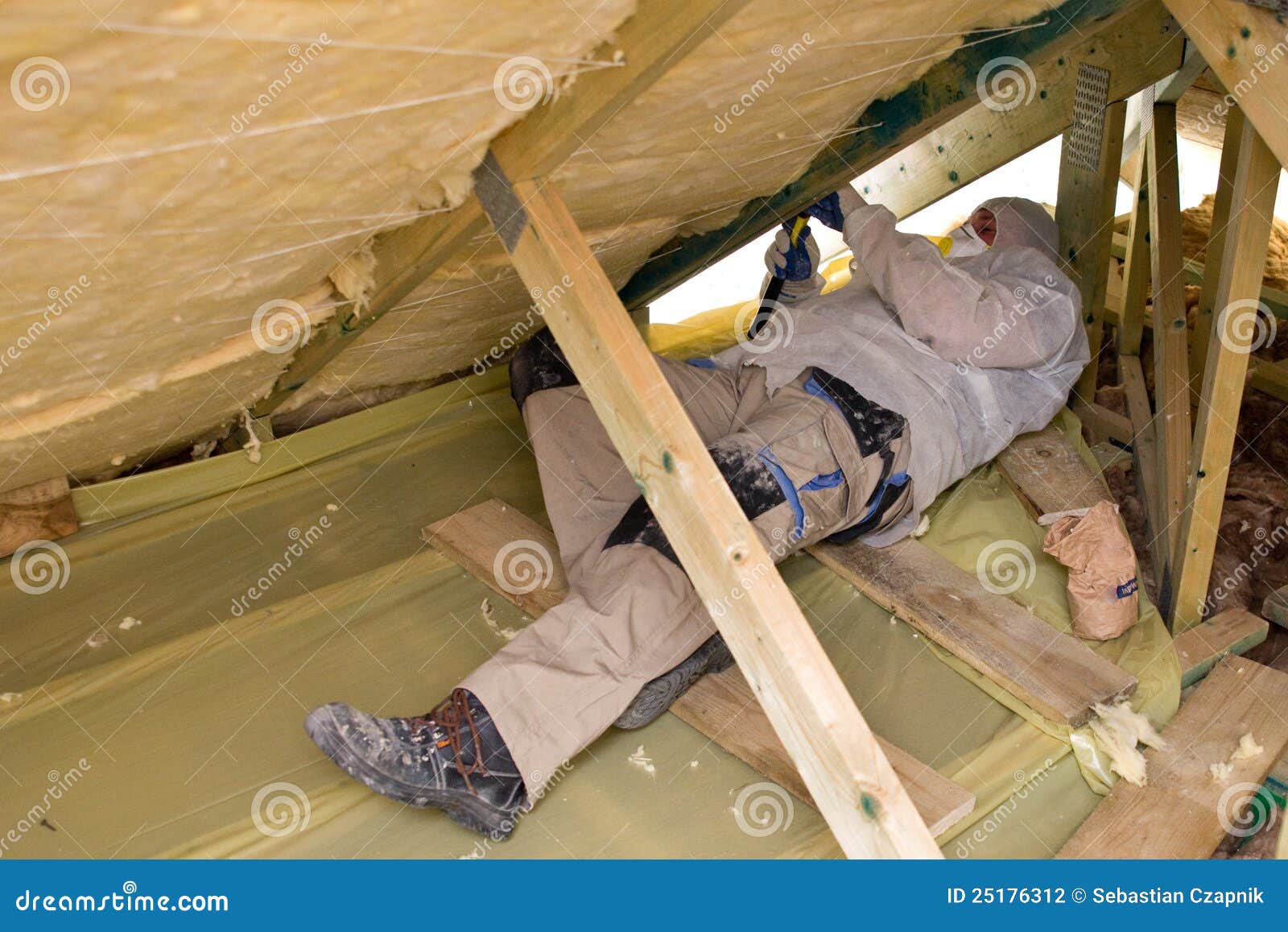 Man insulating a roof stock photo. Image of caucasian - 25176312