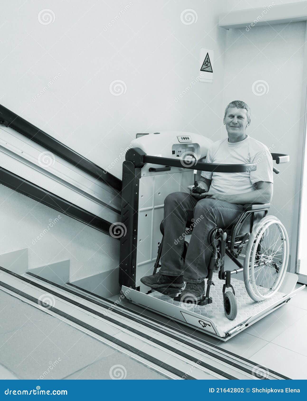 Man in an invalid chair stock photo. Image of drive, disablemant - 21642802