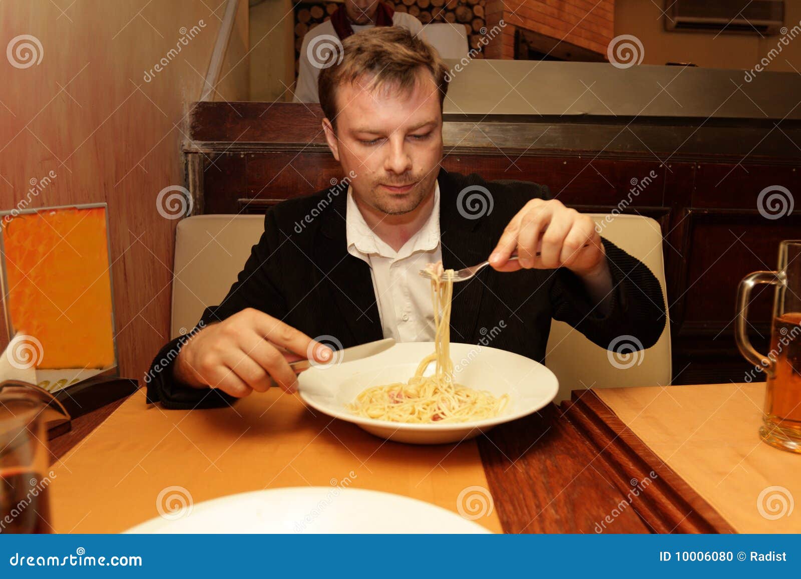 Man in italian restaurant stock photo. Image of eating - 10006080