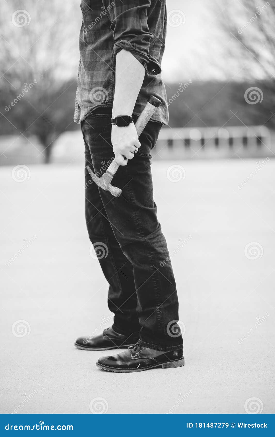 Man in Jeans Holding an Old Rusty Hammer in Grayscale Stock Image ...