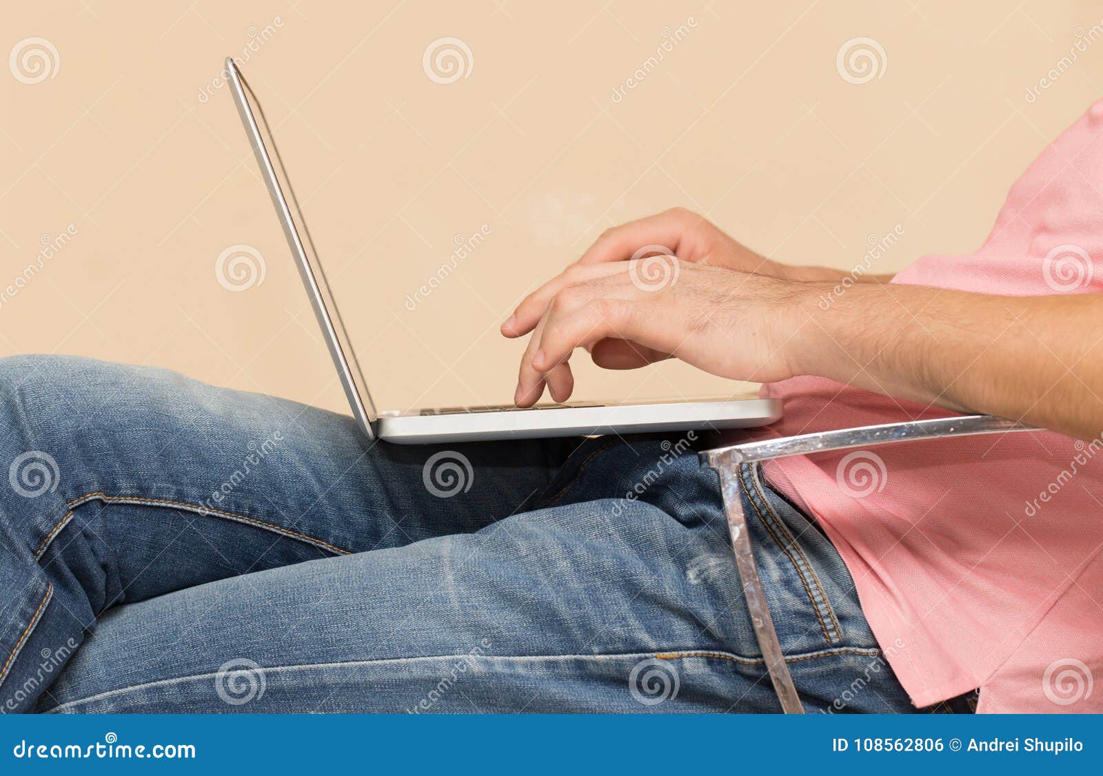 Man in jeans with a laptop stock photo. Image of desktop - 108562806