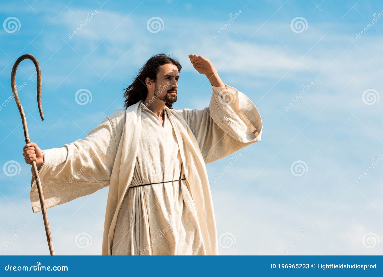 Man in Jesus Robe Holding Cane Against Stock Image - Image of european ...