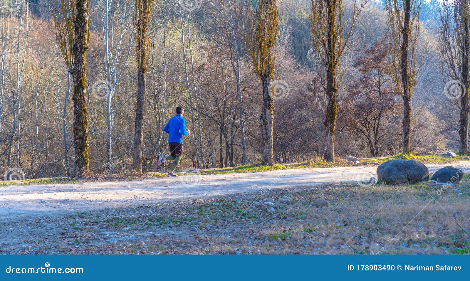Man jogging along the path editorial image. Image of race - 178903490