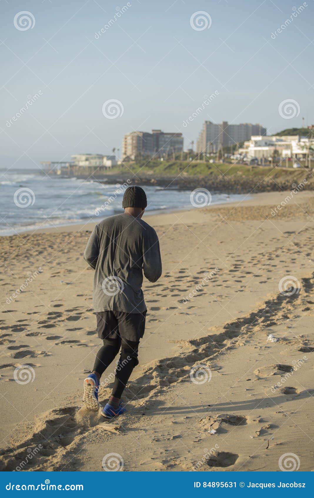Man jogging on beach stock image. Image of athlete, beautiful - 84895631