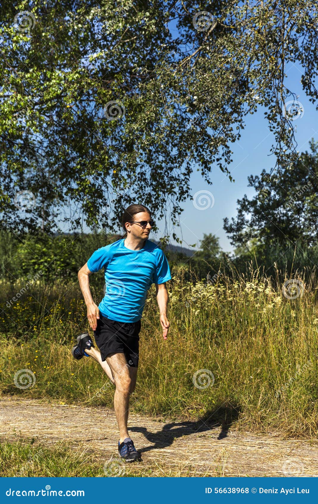 Man Jogging in Nature in Summer Stock Photo - Image of jogging ...
