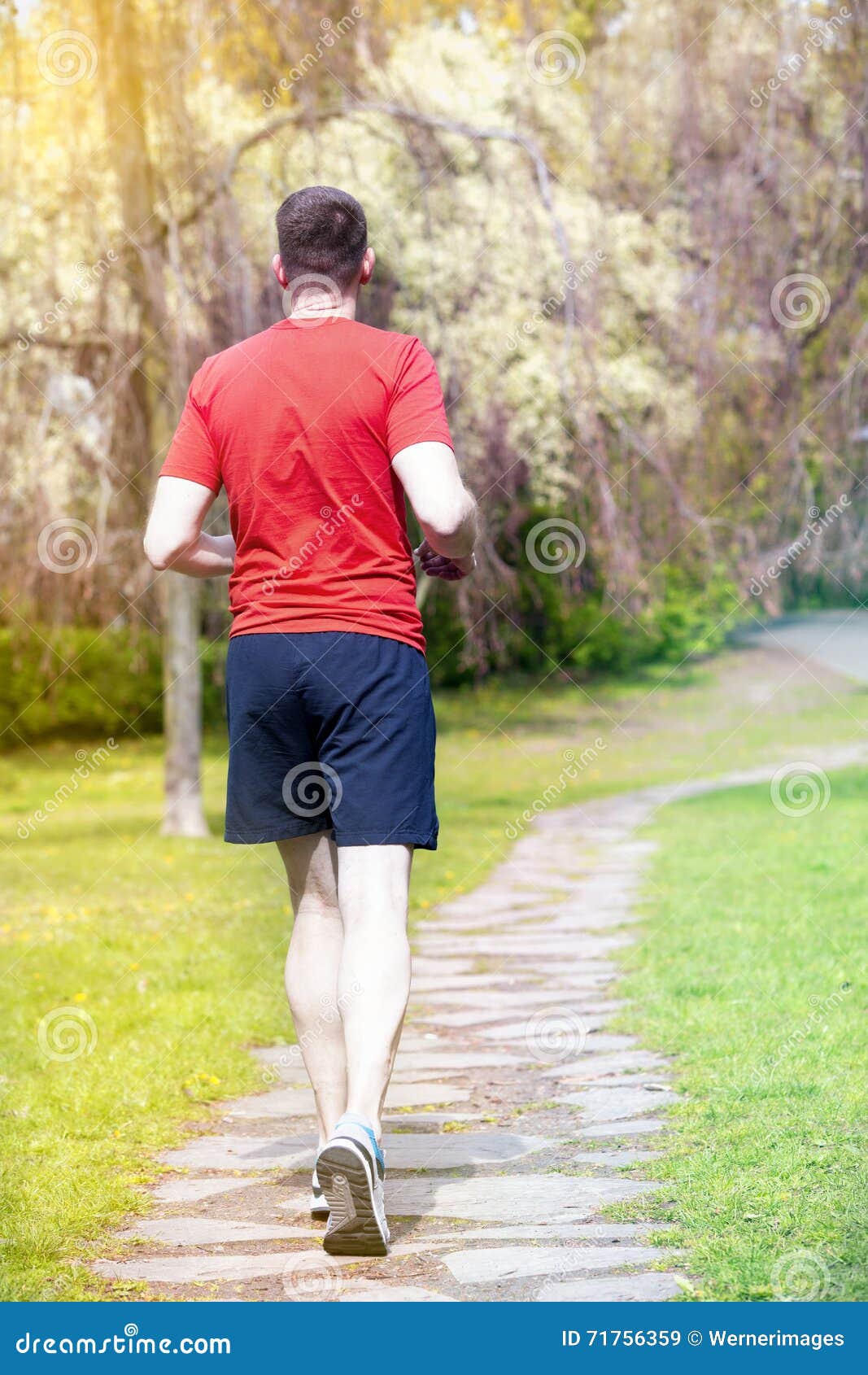 Man Jogging Outdoors in a Park Stock Image - Image of outside, motion ...
