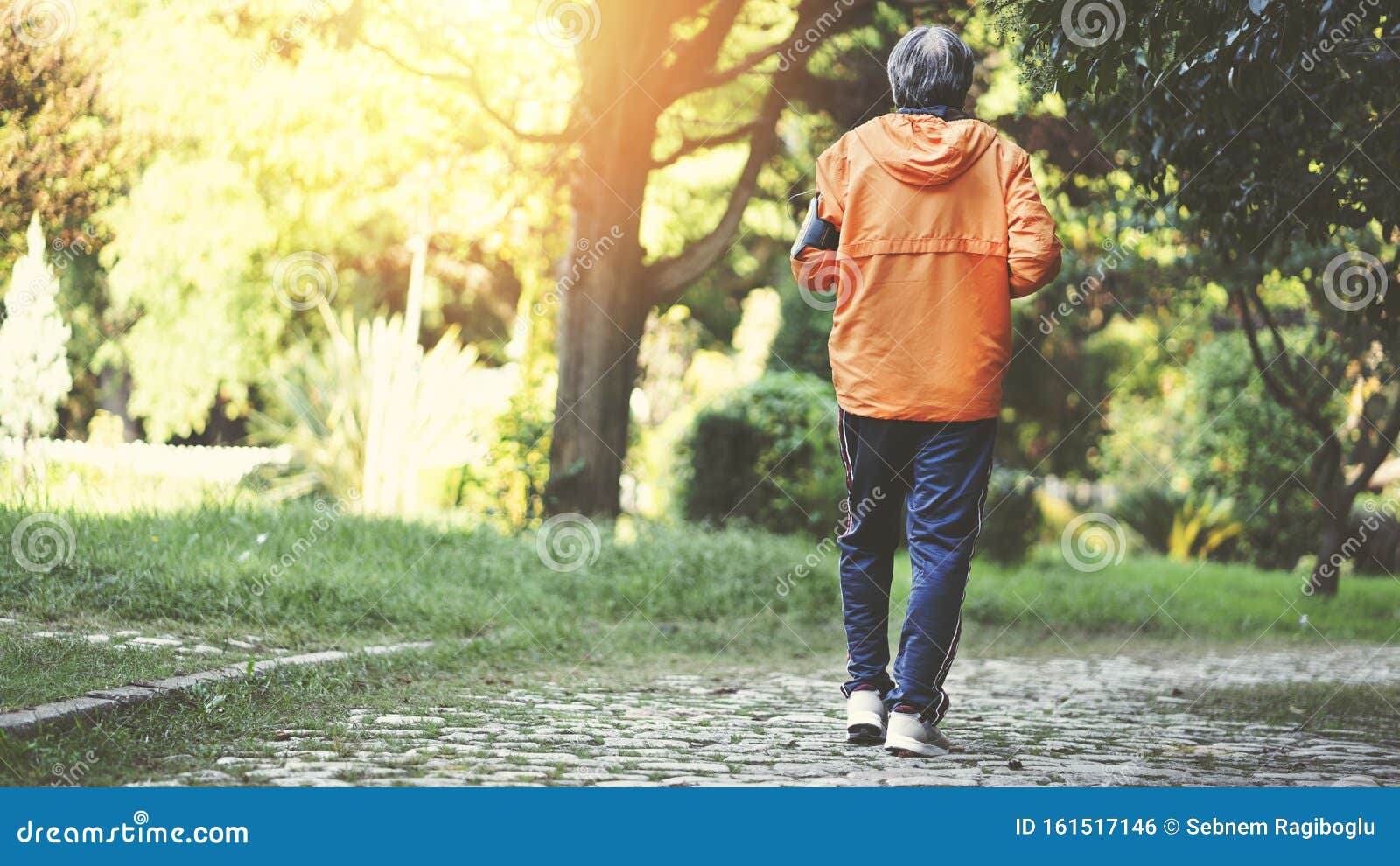 Man jogging in the park stock photo. Image of sport - 161517146