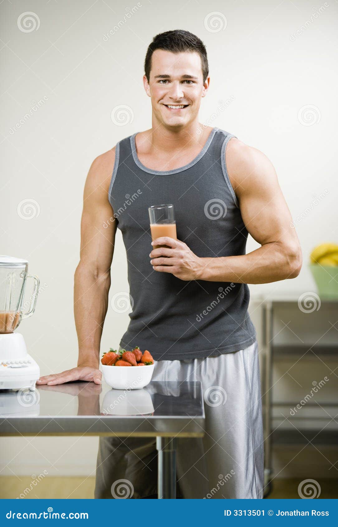 Man with Juice Smoothy stock image. Image of muscular - 3313501