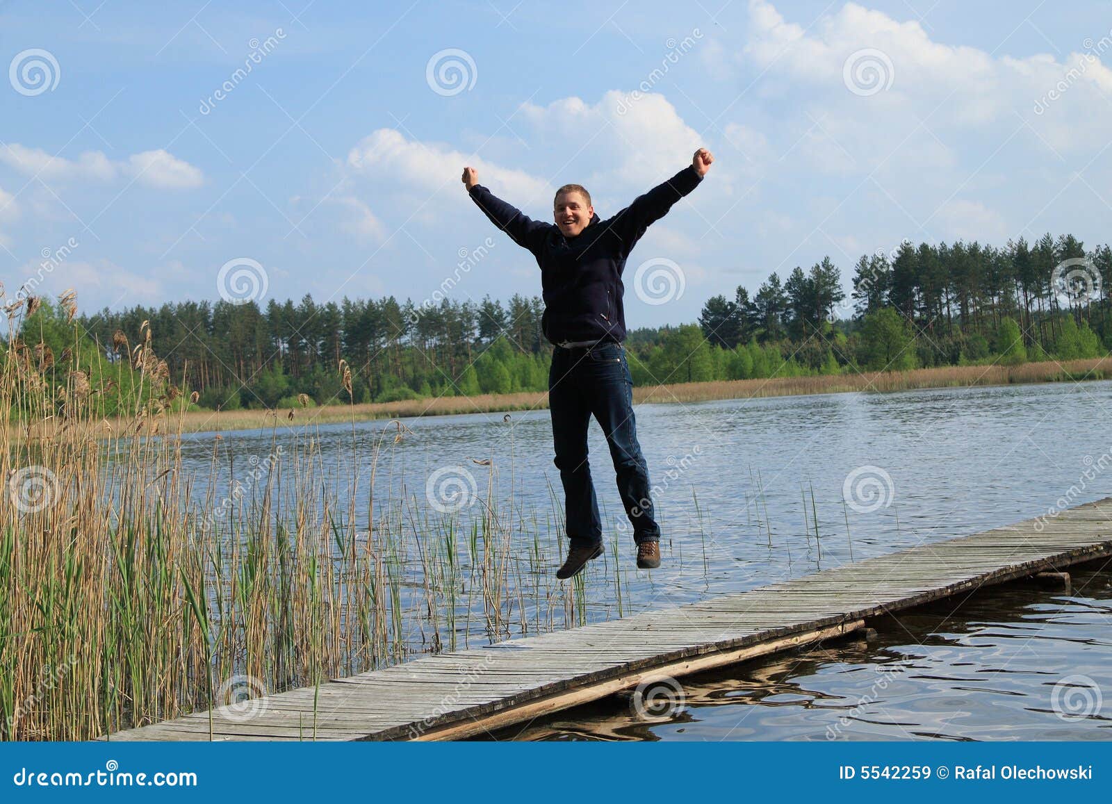 Man juming on pier stock image. Image of smile, smiling - 5542259